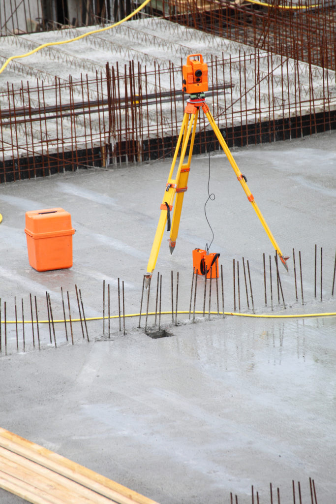 equipment theodolite tool at construction site - Centec Engineering, PLLC